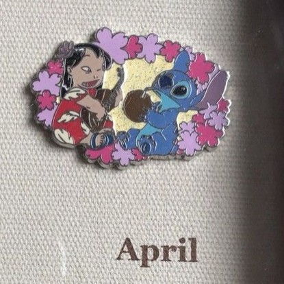 12409 - Lilo & Stitch with Flowers - Year of the Stitch Framed Calendar ...
